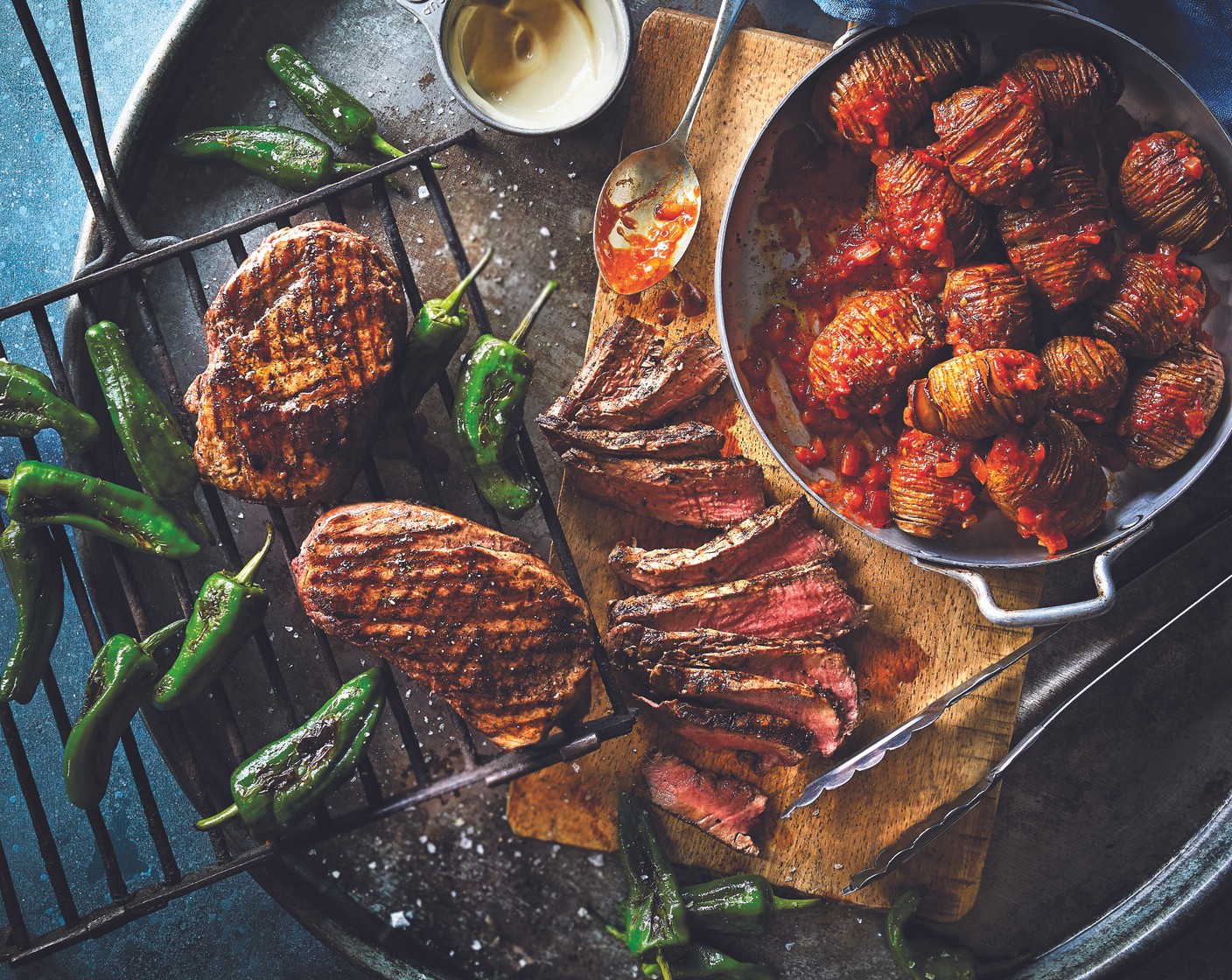 Sizzling Spanish beef fillets with hasselback patatas bravas Recipe | M&S