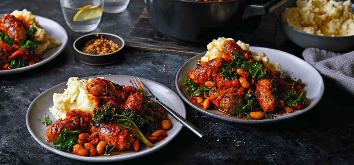 Saucy sausages and beans with mega-creamy mash Recipe | M&S